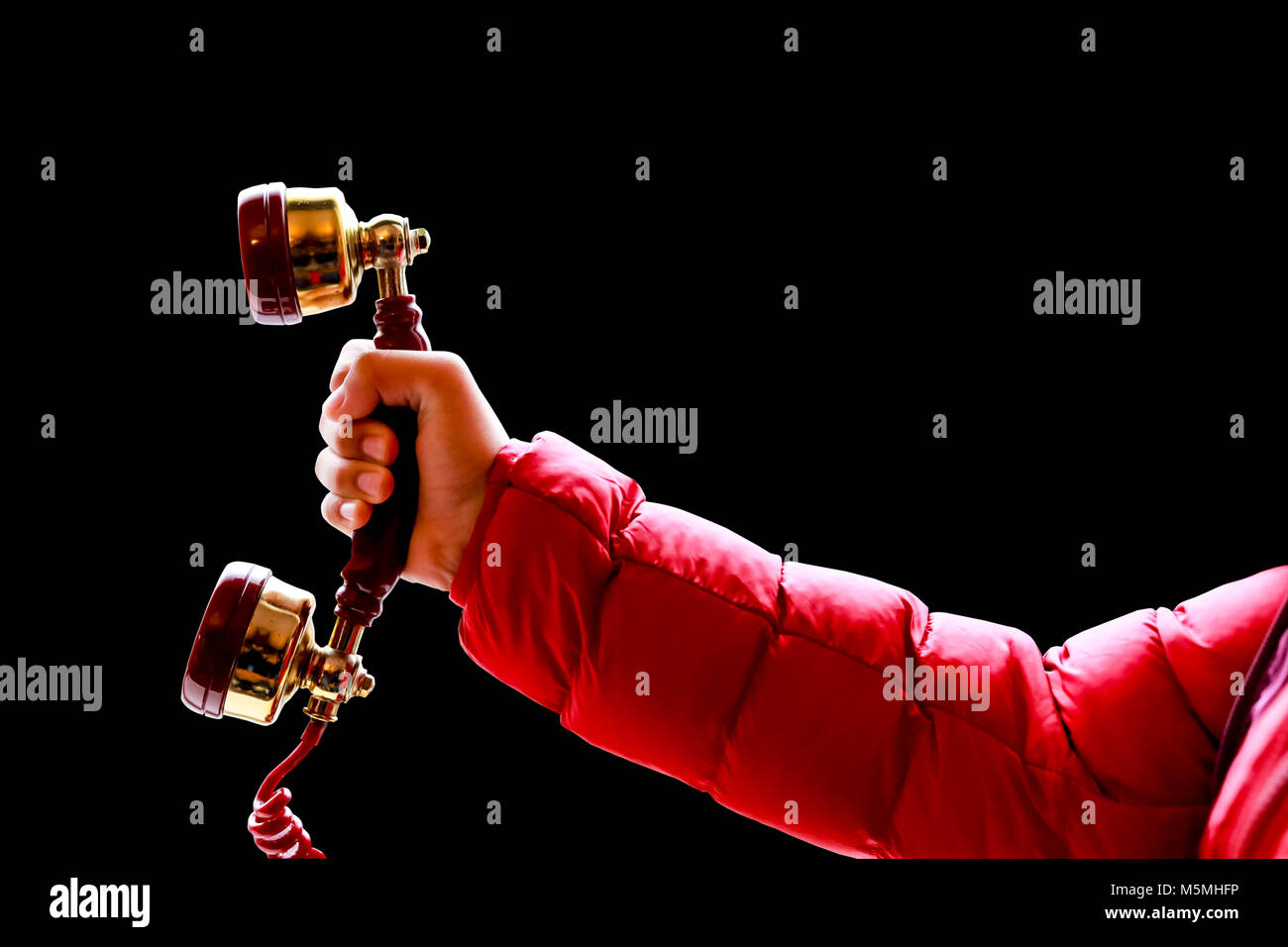 Woman's hand with retro red phone Stock Photo - Alamy