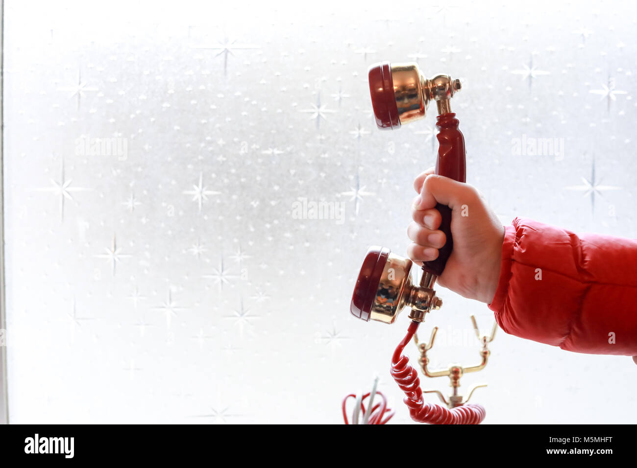 woman's hand with retro red phone Stock Photo - Alamy