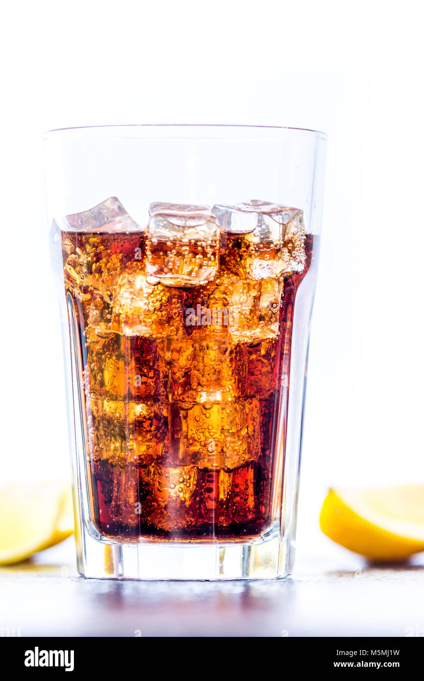 Cold cola drink with bubbles and ice cubes Stock Photo - Alamy