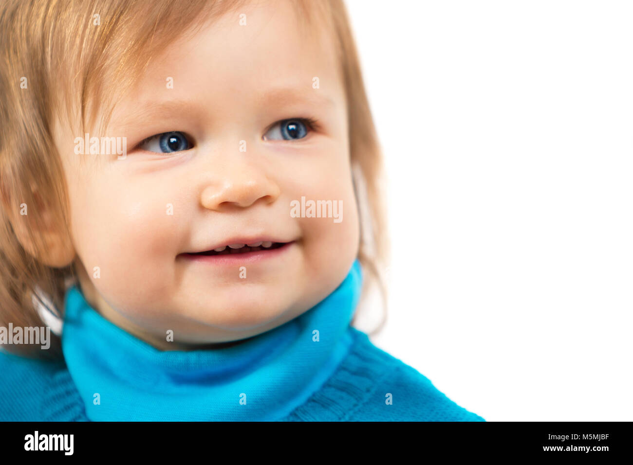 Portrait of a beautiful little smiling girl. Child's face face closeup ...