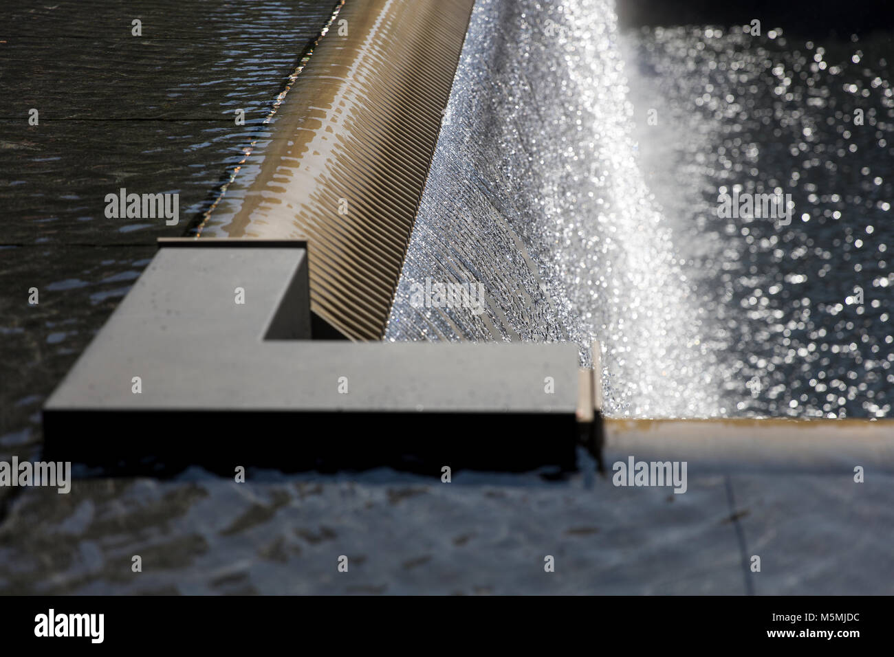 Detail of the memorial waterfalls in World trade center site, New York ...