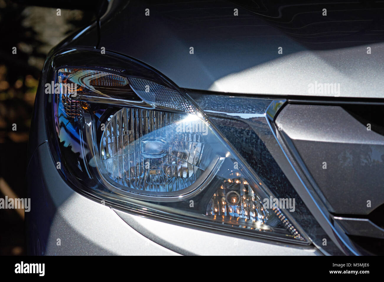 Silver pickup head light closeup. Big shiny pickup car headlight Stock ...