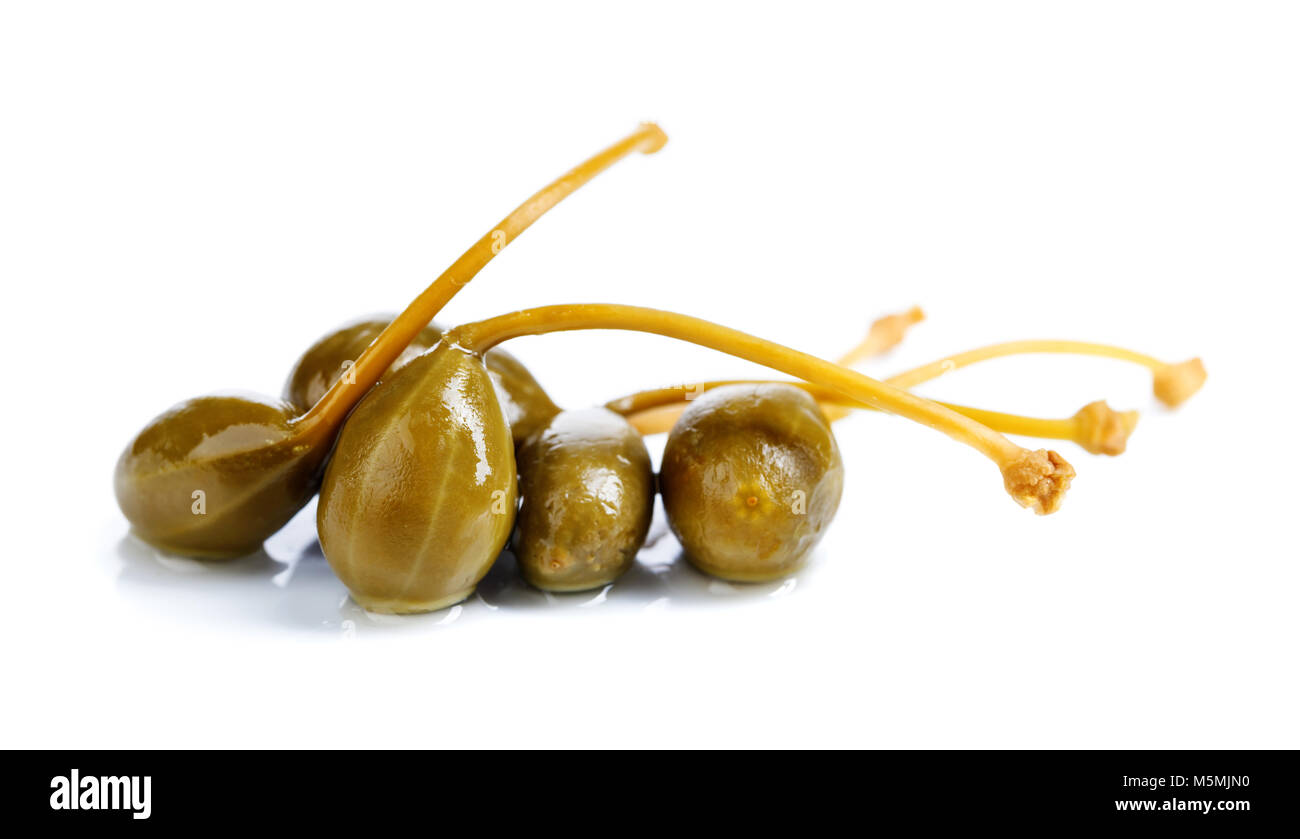Pickled caper berries isolated on white background . Edible fruits of ...