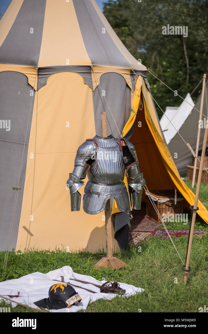 Medieval Metallic Armor and Ancient Tent in background Stock Photo - Alamy