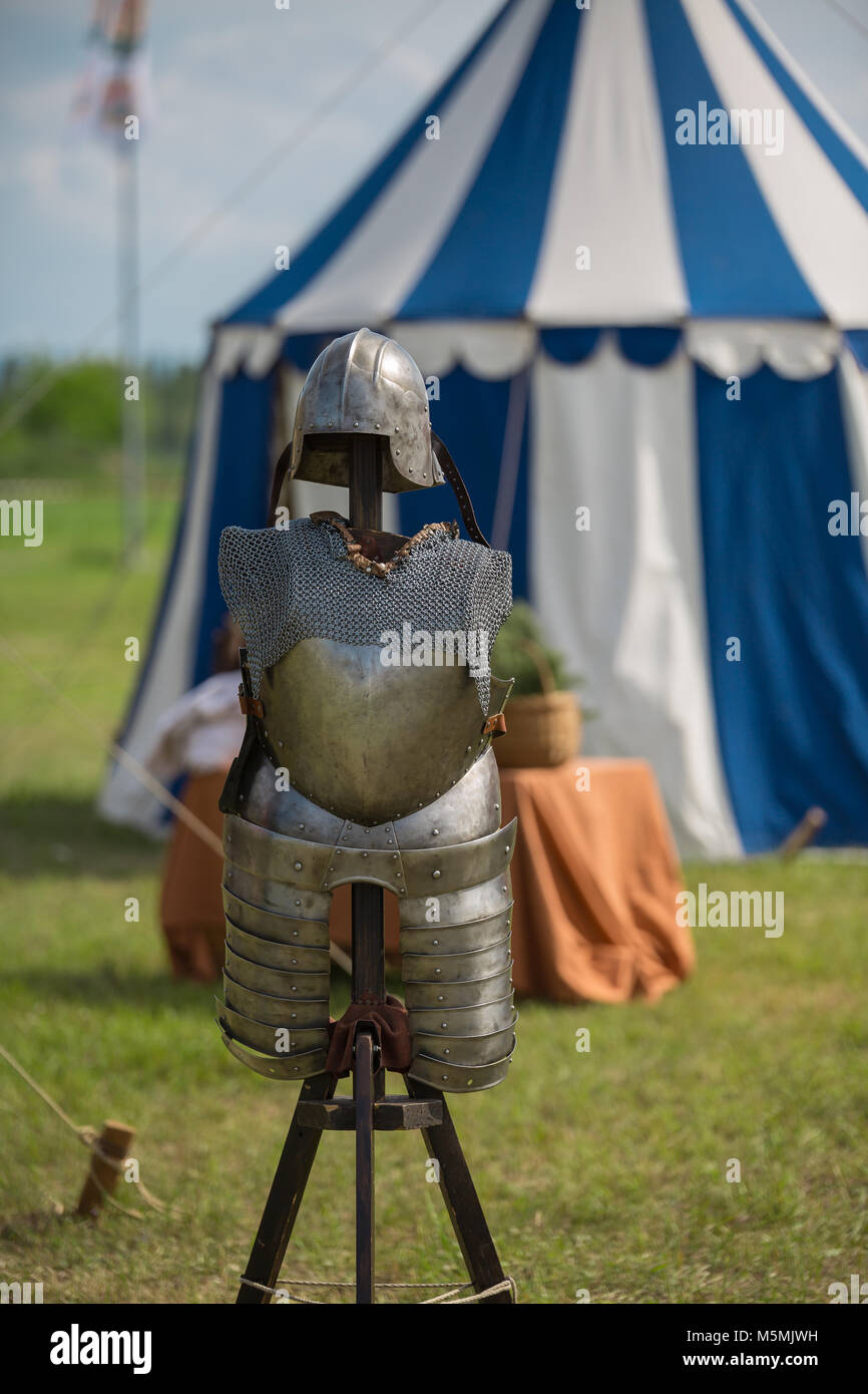 Medieval Metallic Armor and Ancient Tent in background Stock Photo - Alamy