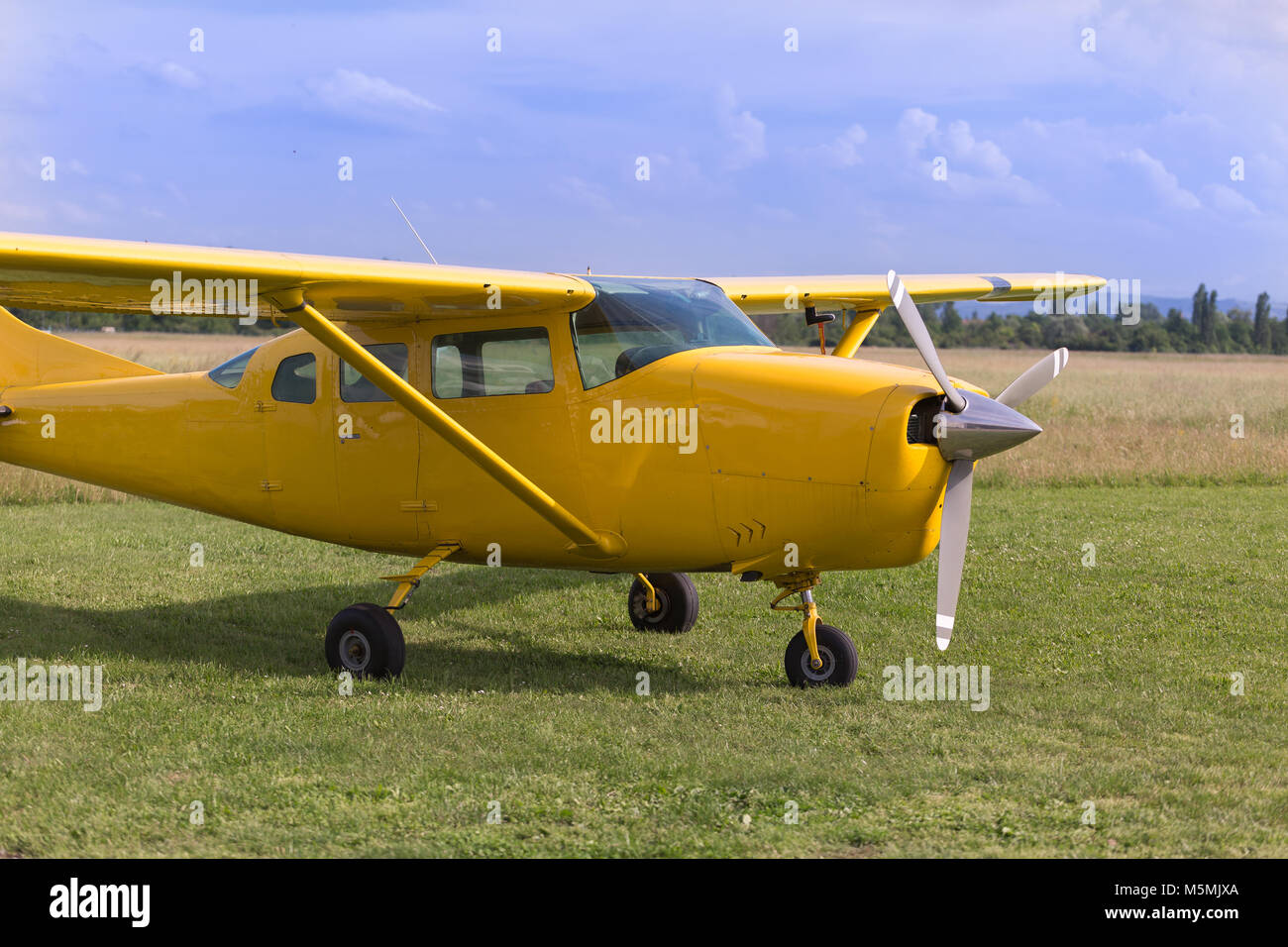 Small and Light Yellow Piper Aircraft near to the Runaway Ready to Take ...