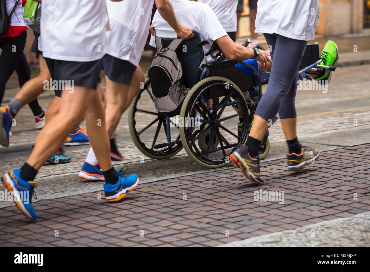 Male Wheelchair Marathon Runner High Resolution Stock Photography and ...