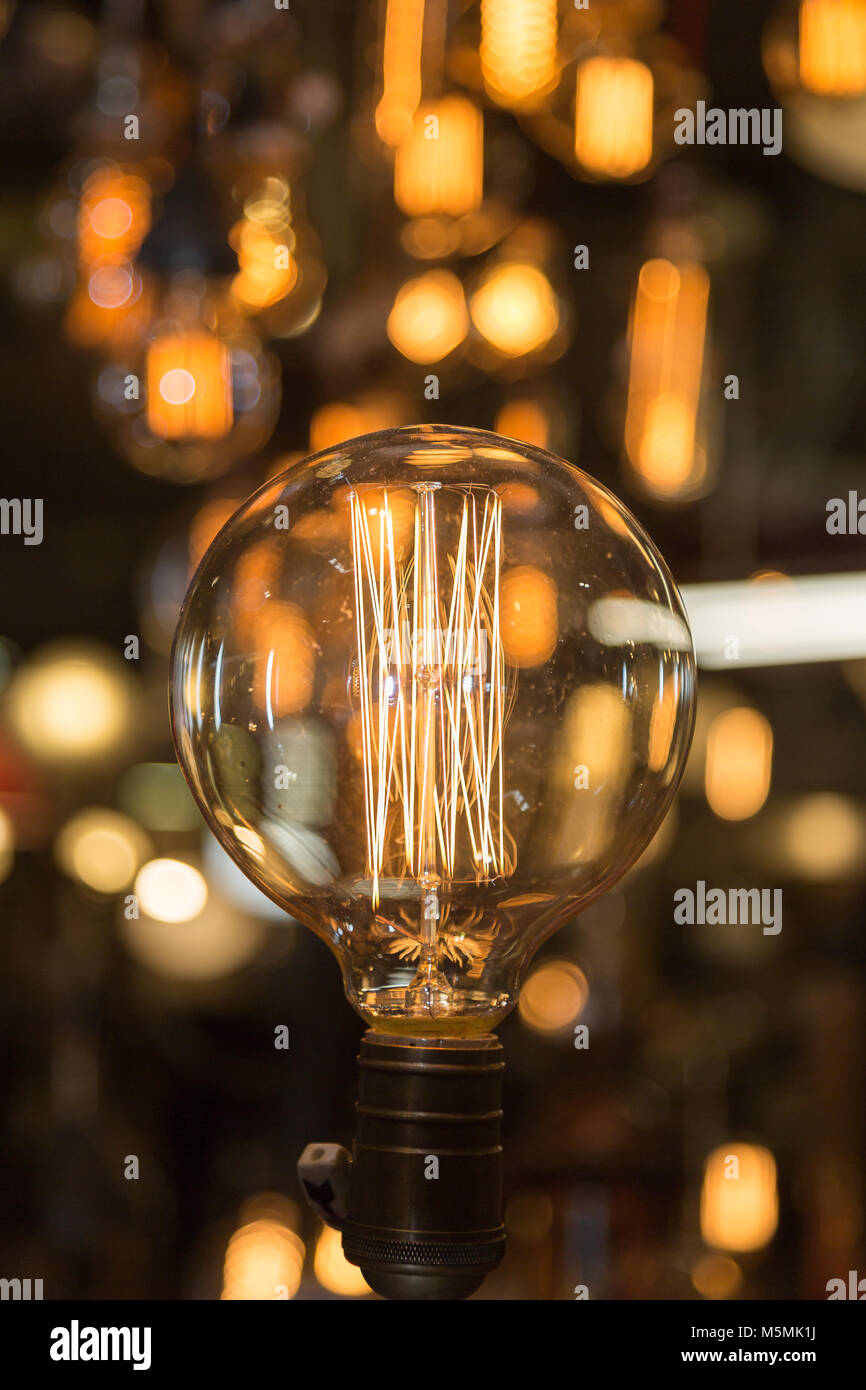 Single Vintage Electric Light Bulb with Incandescent Filament Stock ...