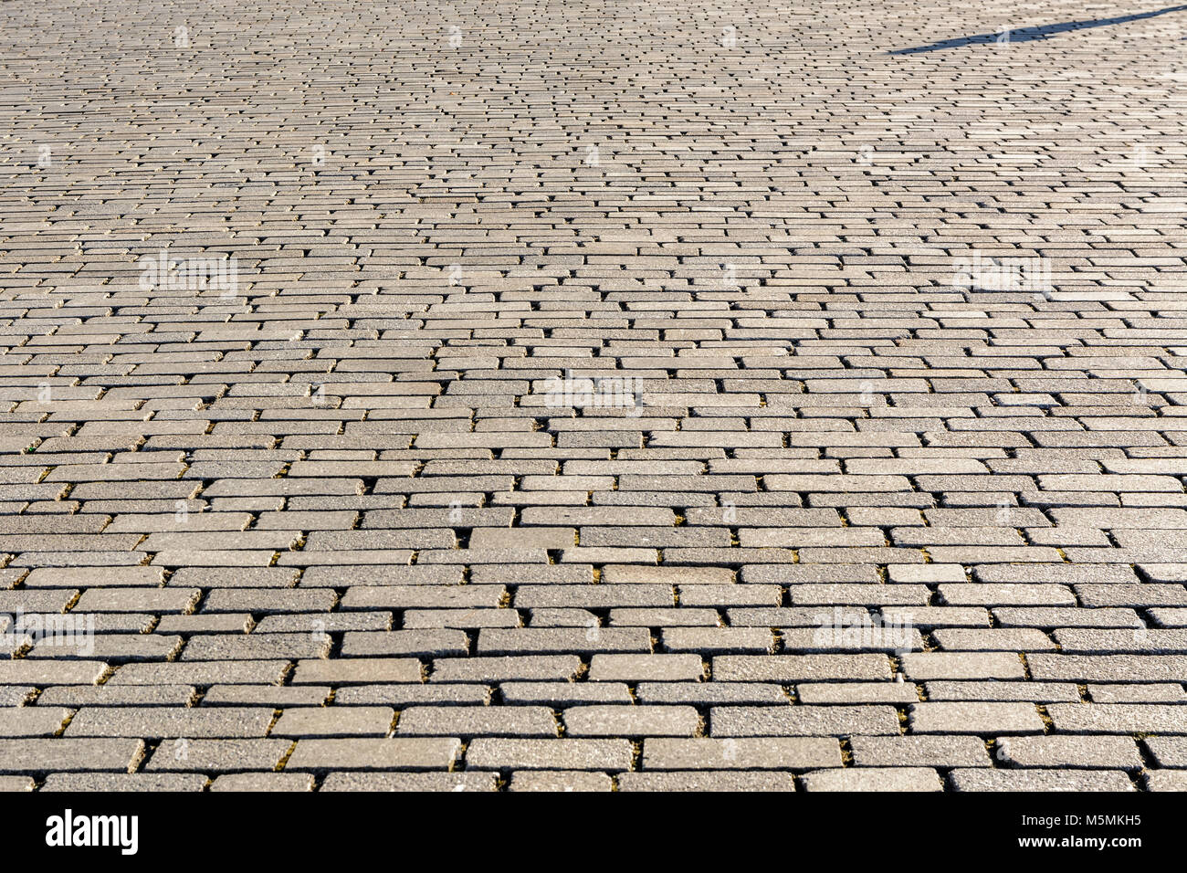 pavement with a shadow in the corner Stock Photo - Alamy