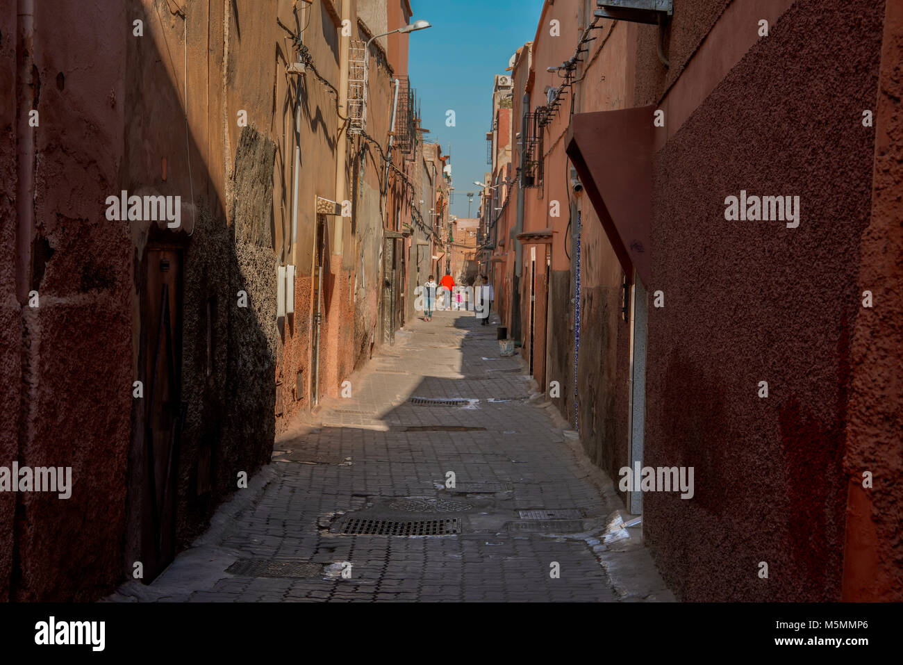 Narrow street in Marrakesh, Morocco Stock Photo - Alamy