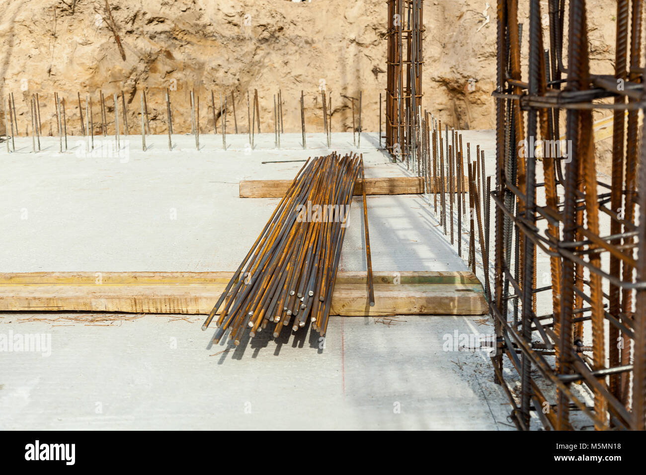 Construction workers fabricating steel reinforcement bar at the ...