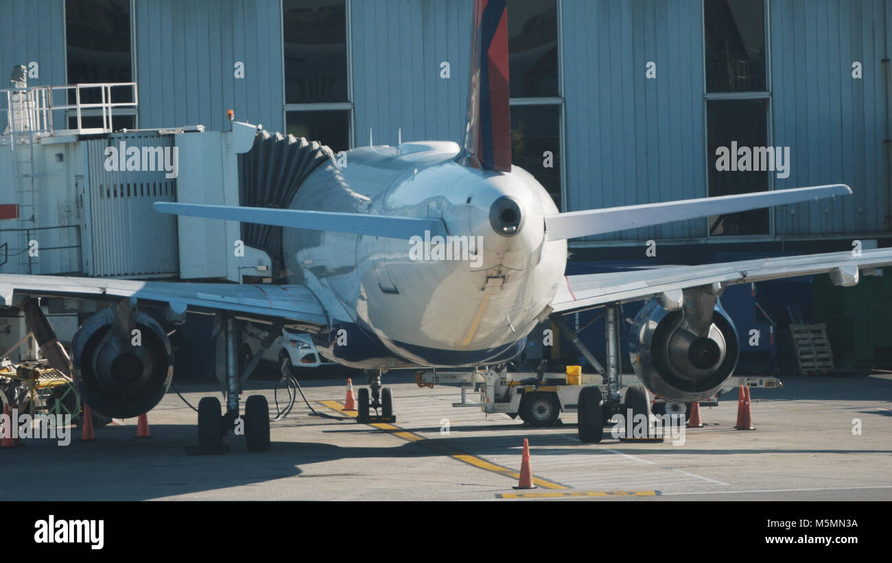 Airplane - jet on airport - rear view Stock Photo - Alamy