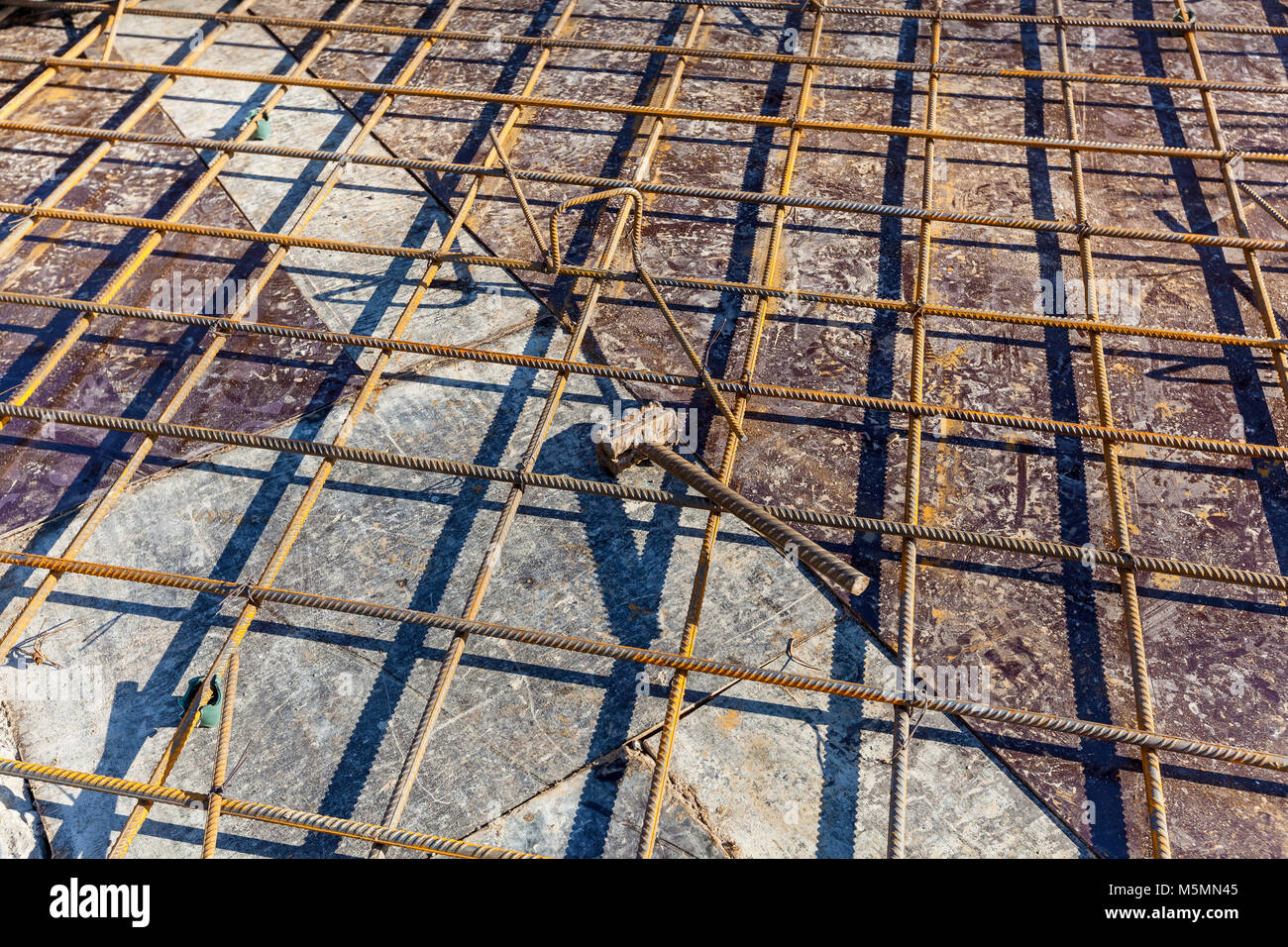 Construction workers fabricating steel reinforcement bar at the ...