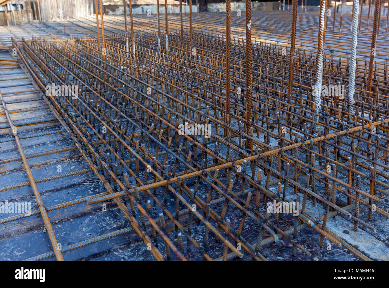 Construction workers fabricating steel reinforcement bar at the ...