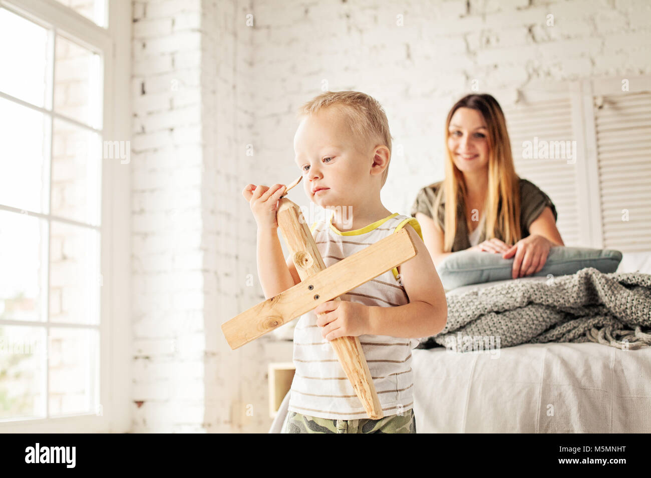 Little child playing having fun at home Stock Photo - Alamy