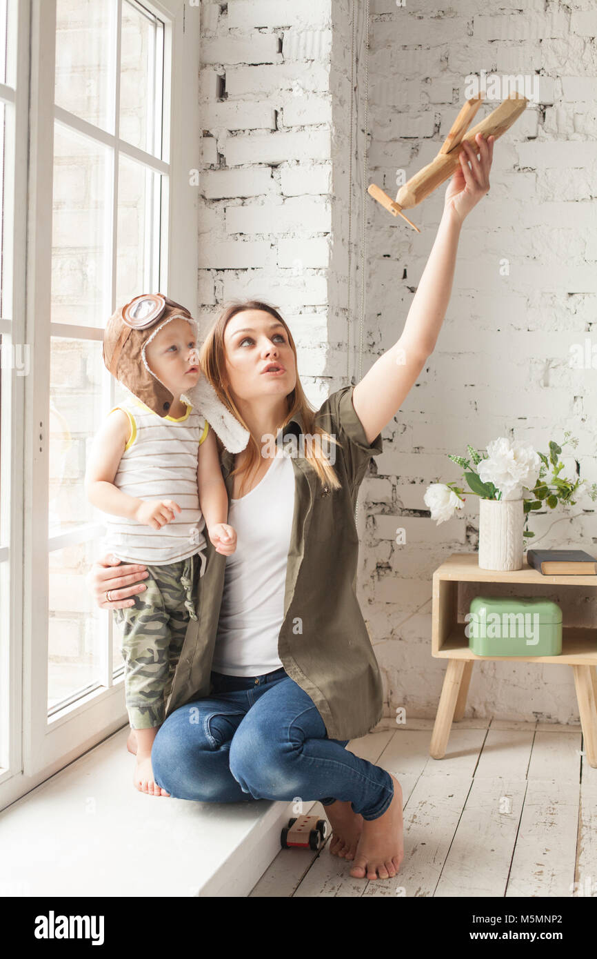 Mom and Son Having Fun at Home. Mother and Child Hugging and Playing ...