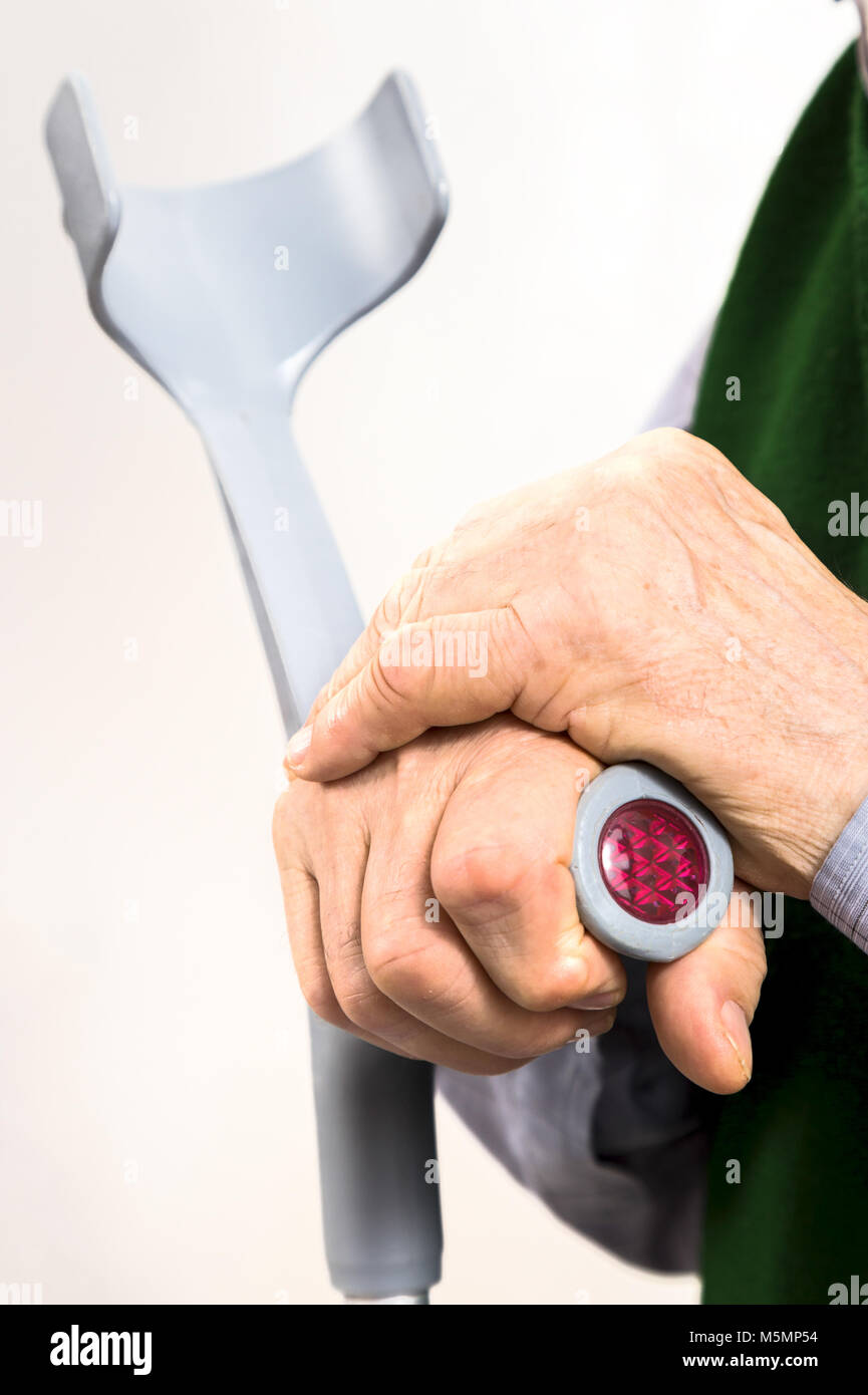 Hands of a old man holding a medical stick Stock Photo - Alamy