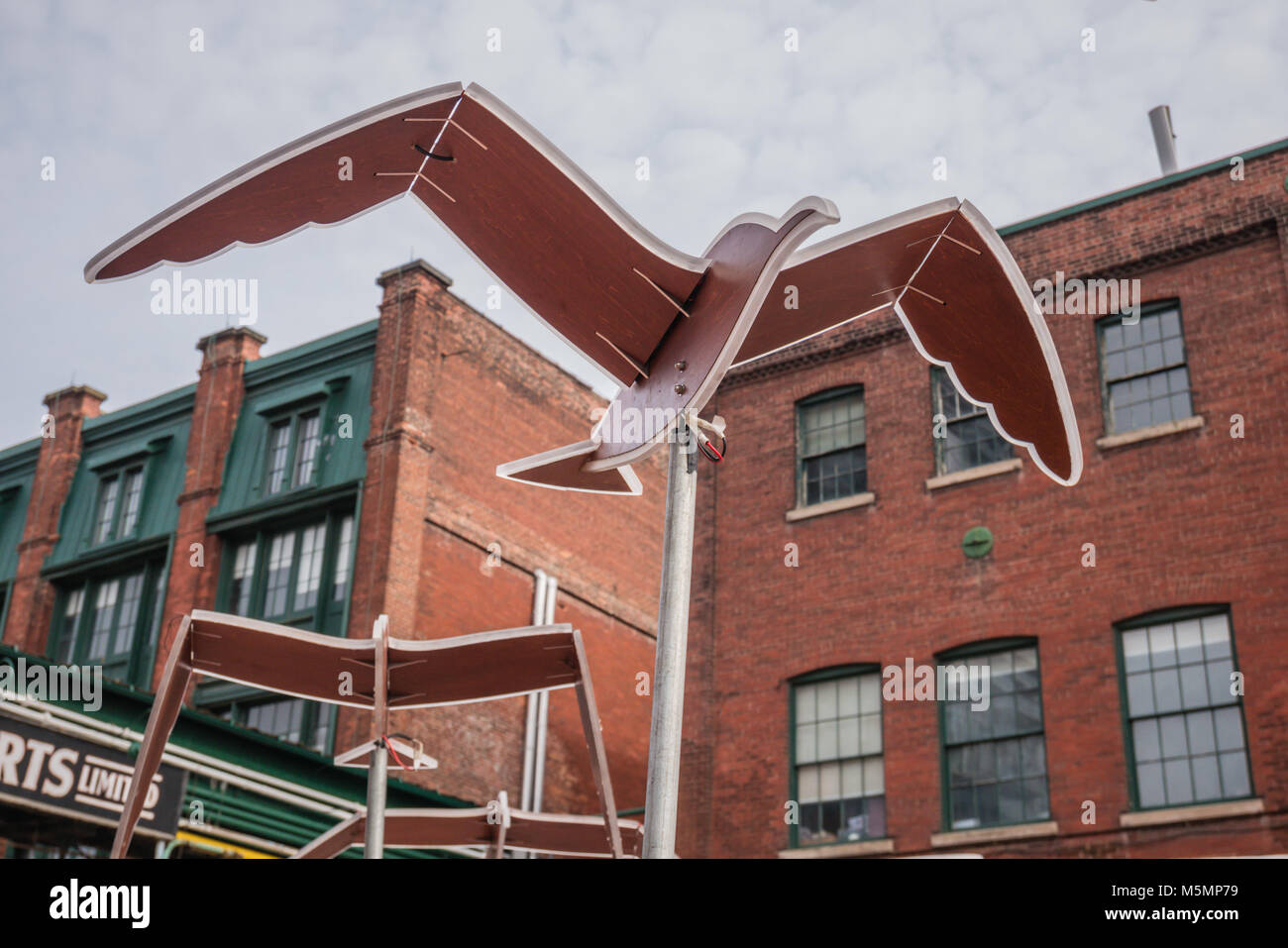 birds sculpture display in toronto distillery district Stock Photo - Alamy