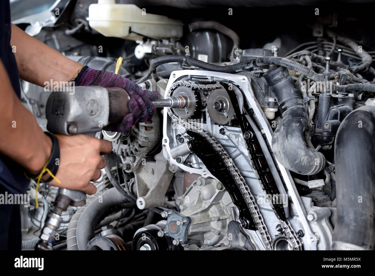 Professional mechanic repairing car engine - Auto repair shop Stock ...