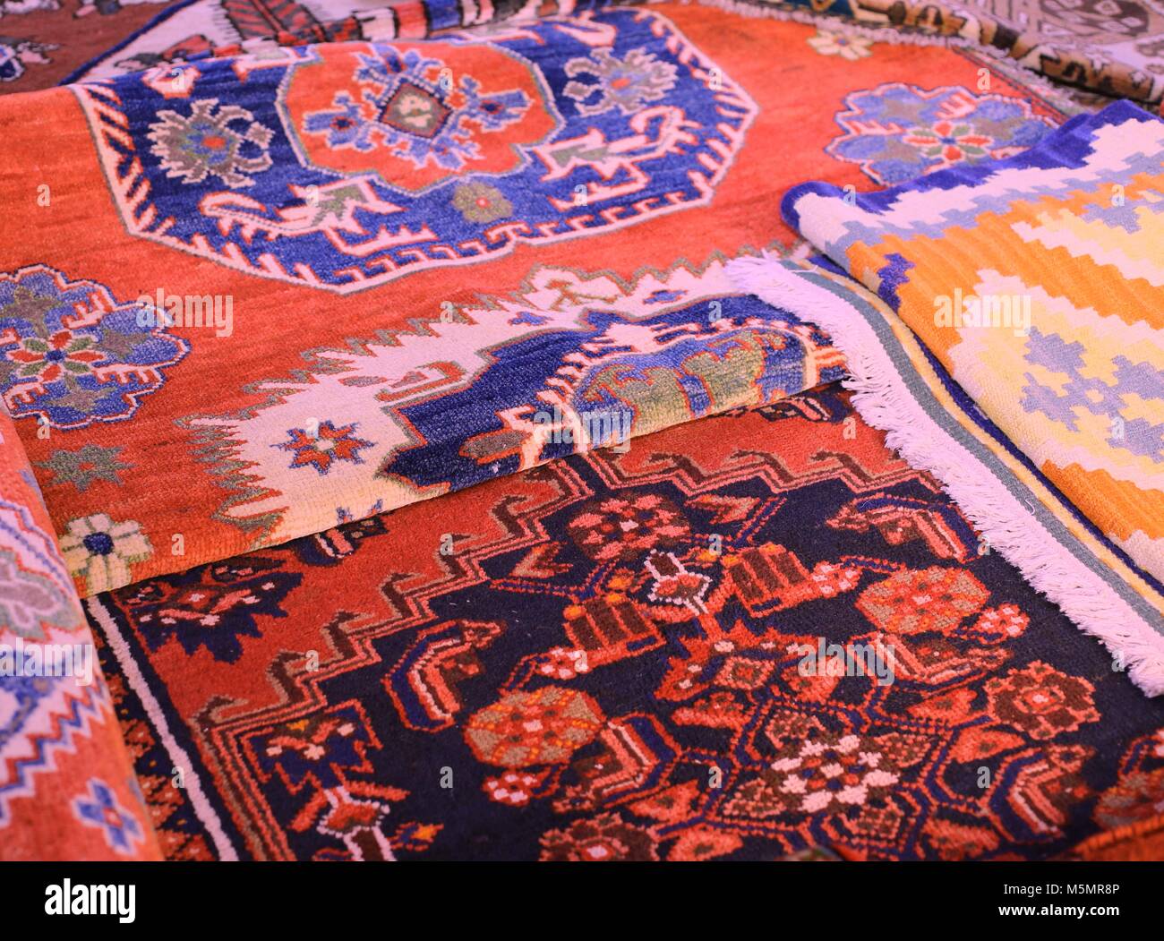 precious ancient colored wool rugs made by hand in the Middle East ...
