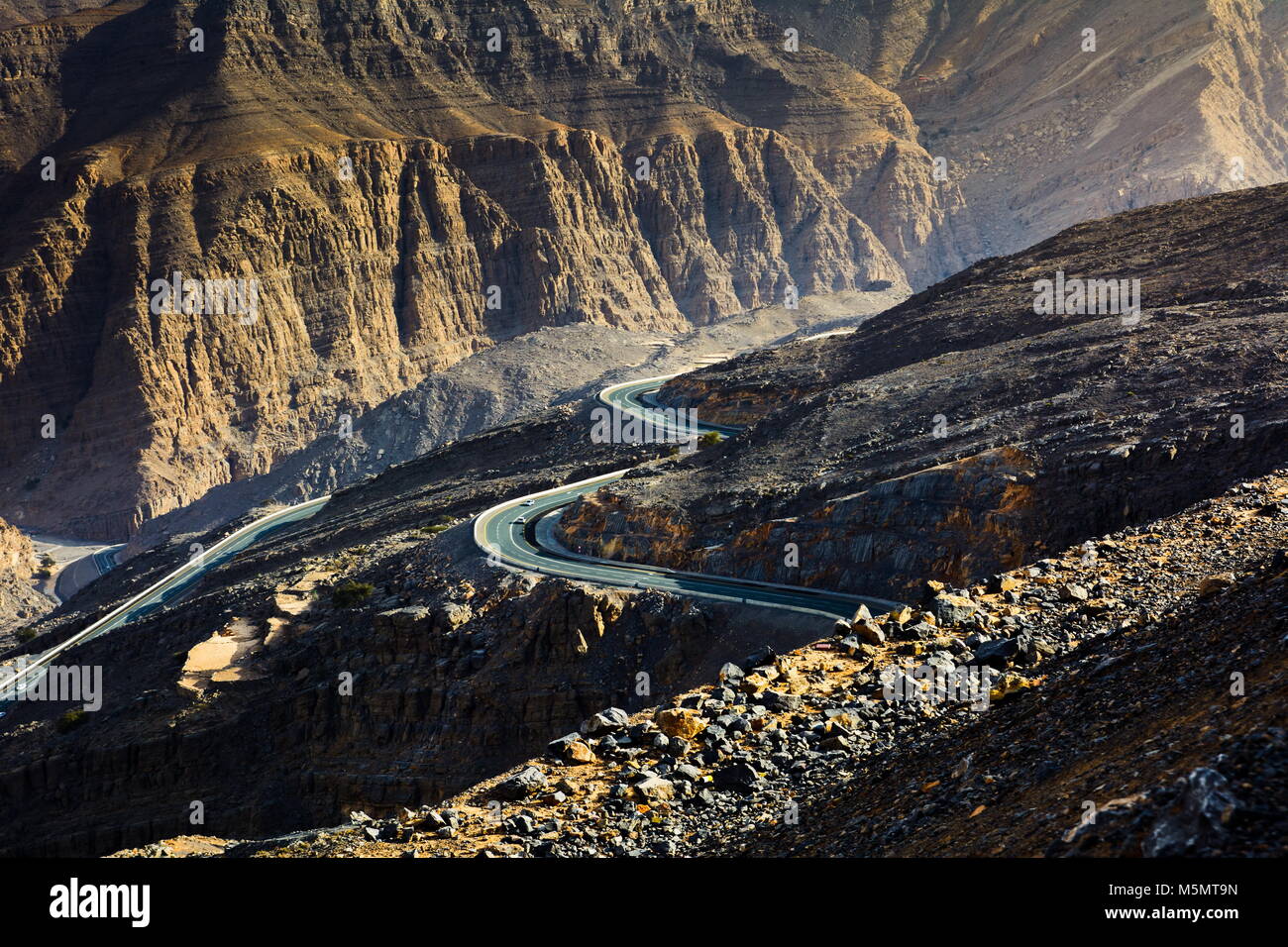 Jabal Jais mountain road at sunset. The highest mountain in United Arab ...