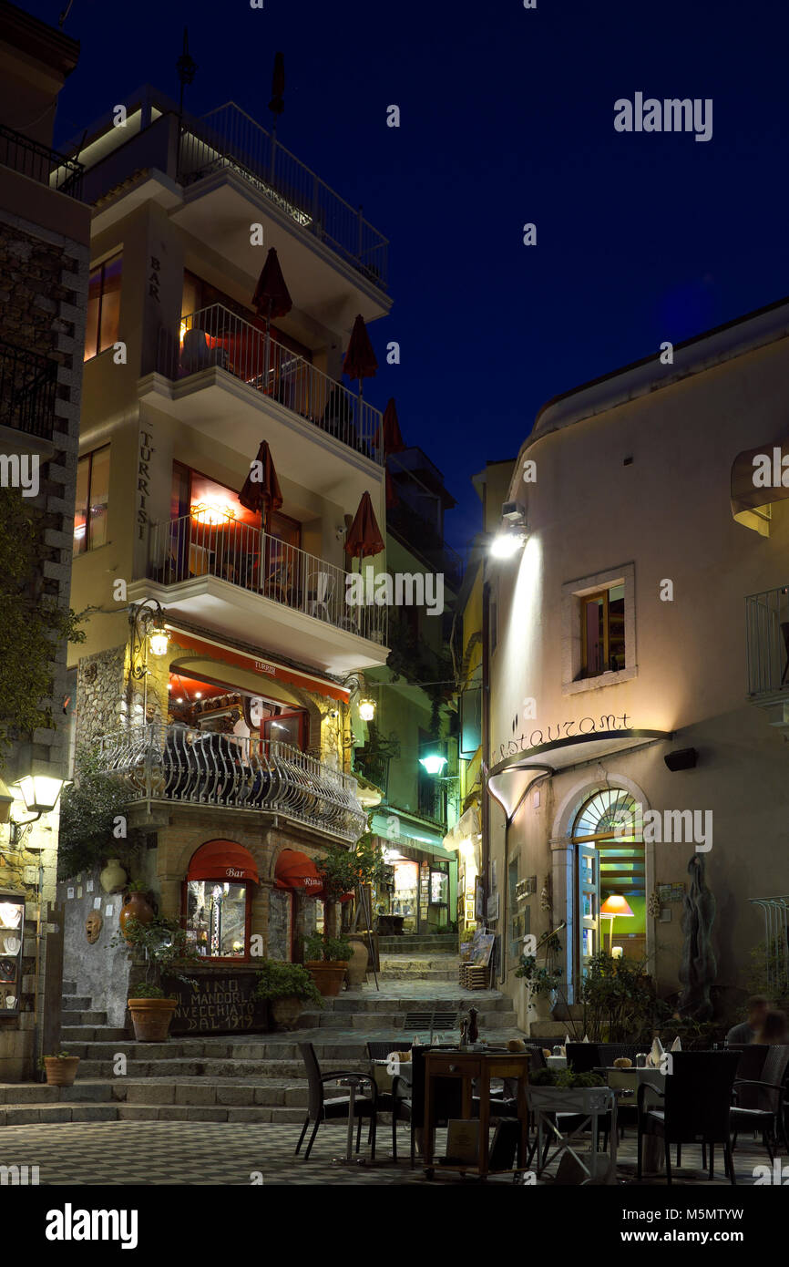 Restaurants at night in Castelmola, Sicily Stock Photo - Alamy