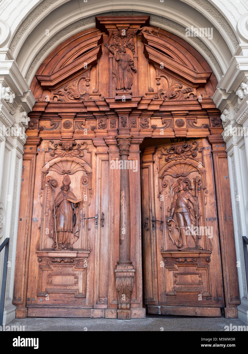 Carved wooden door catholic church hi-res stock photography and images ...
