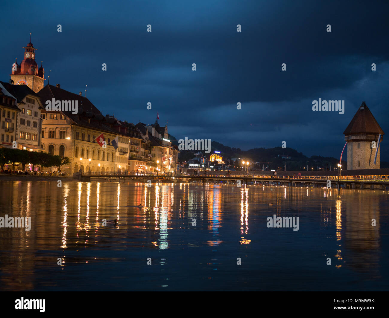 Luzern lights reflected in Reuss River at night Stock Photo - Alamy