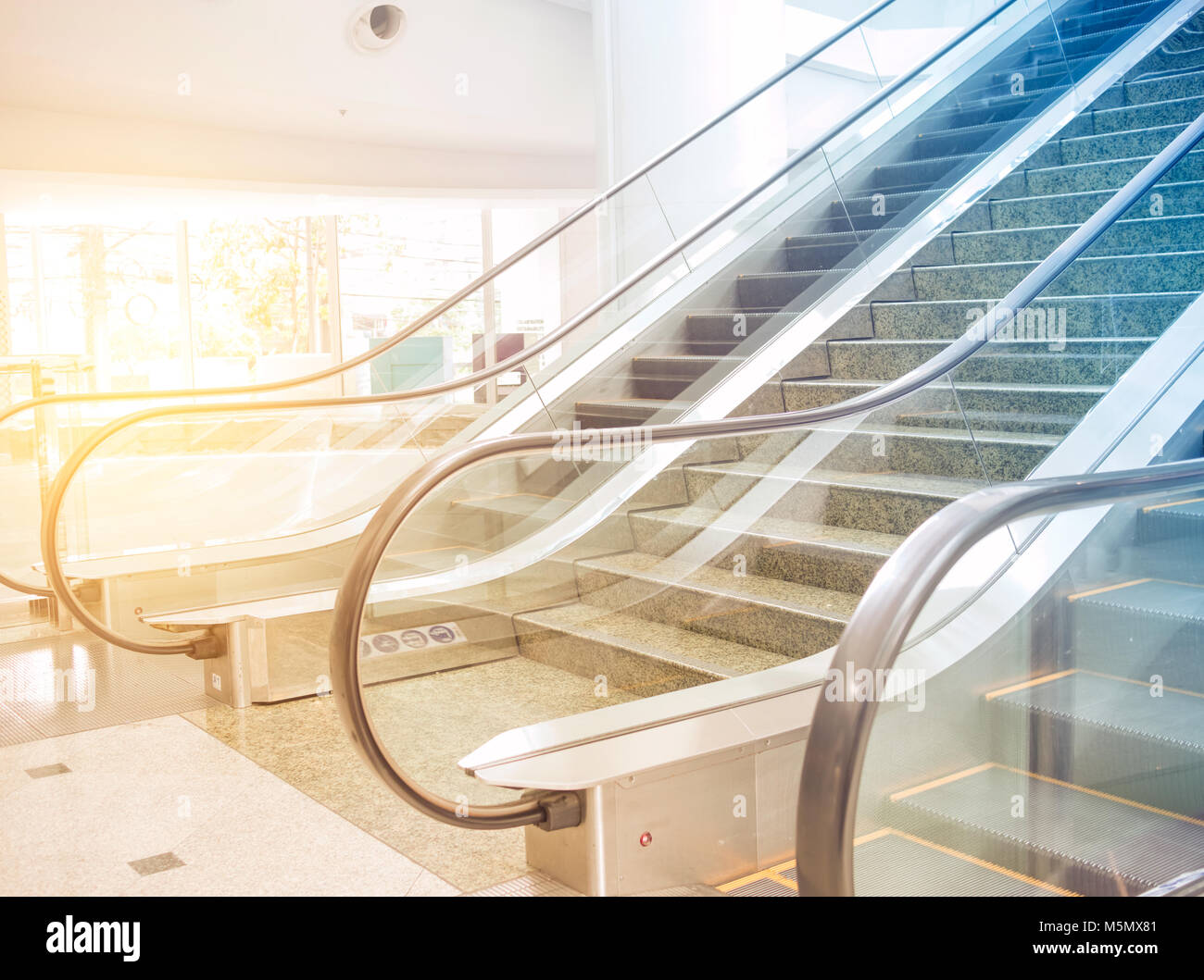 Modern escalator and architecture interior design Stock Photo - Alamy