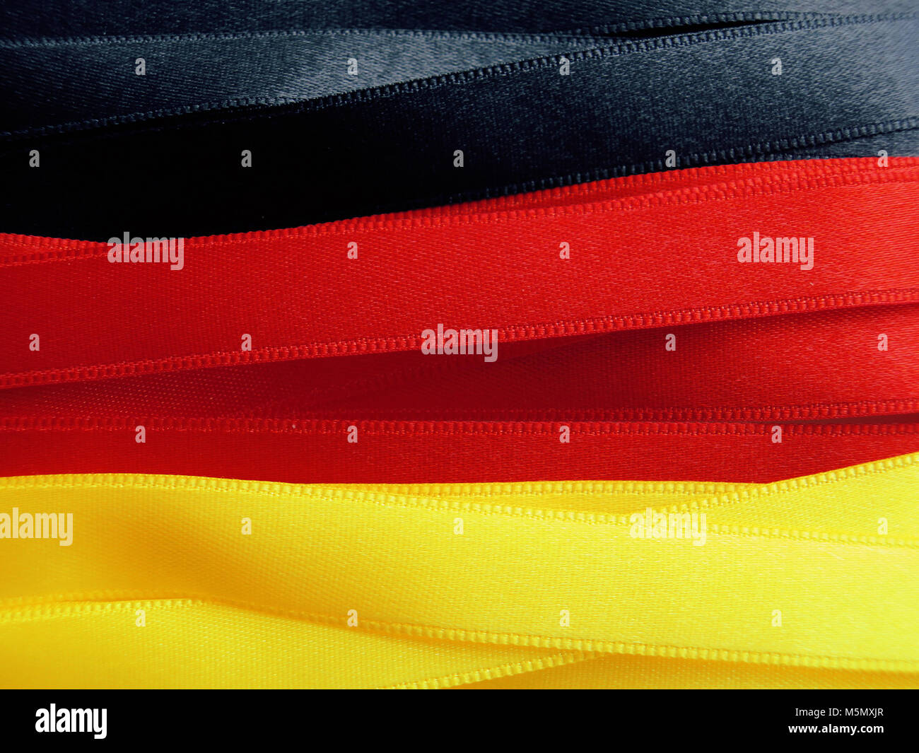 GERMANY flag or banner made with black, red and yellow ribbons Stock ...