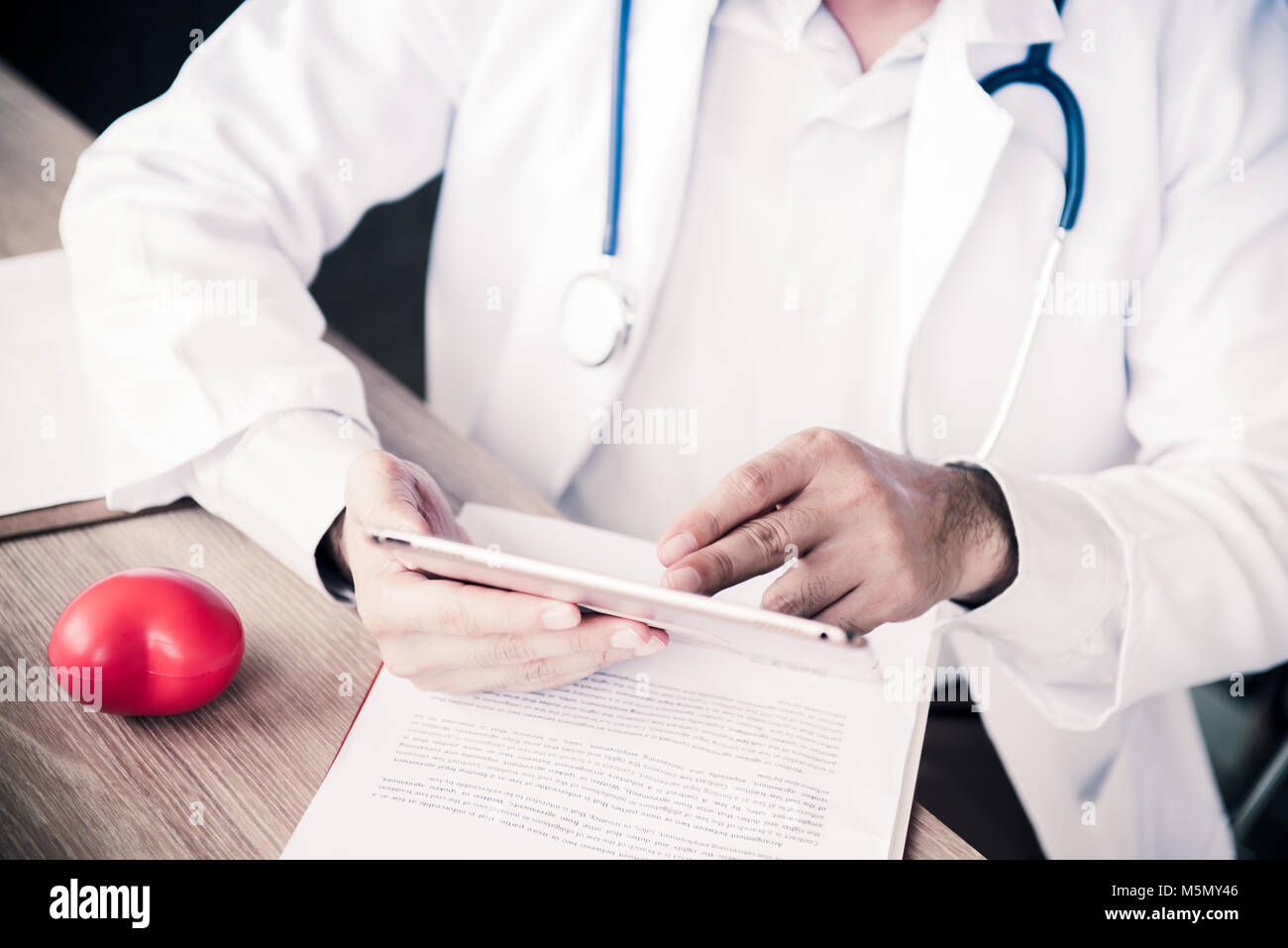 doctor, physical examination and Heart Disease Checker Stock Photo - Alamy