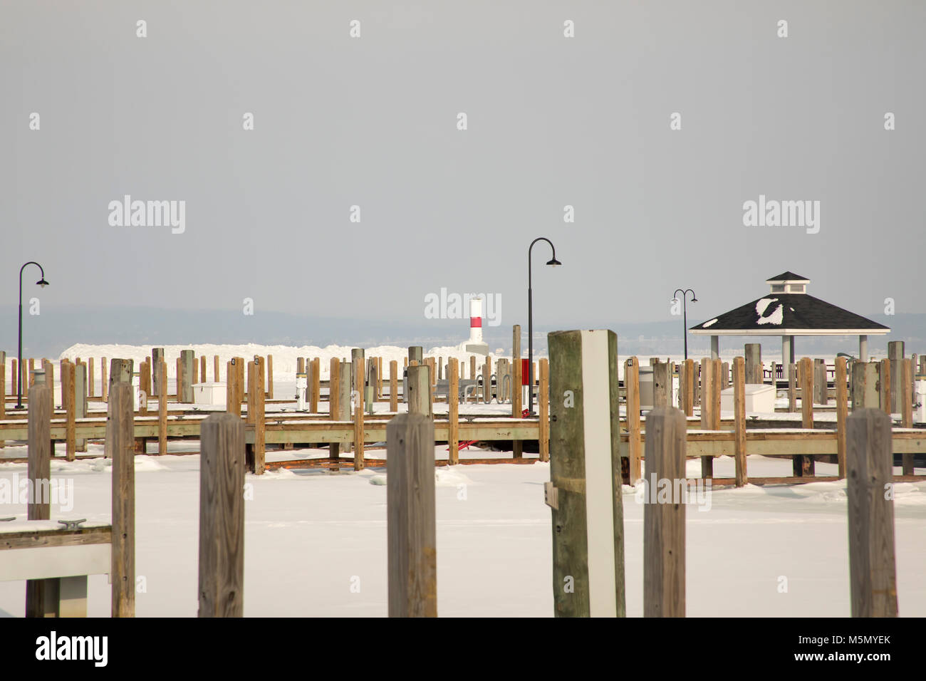 Ice covered Petoskey Lighthouse in Petoskey Marina, Petoskey, Michigan ...