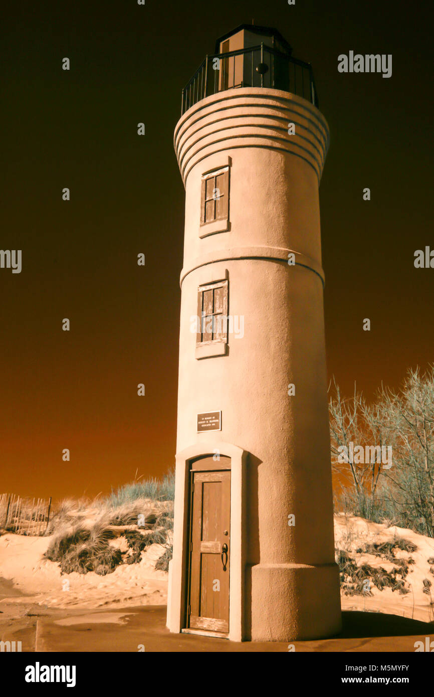 Exterior of historic Manning Memorial Lighthouse on sandy Lake Michigan ...