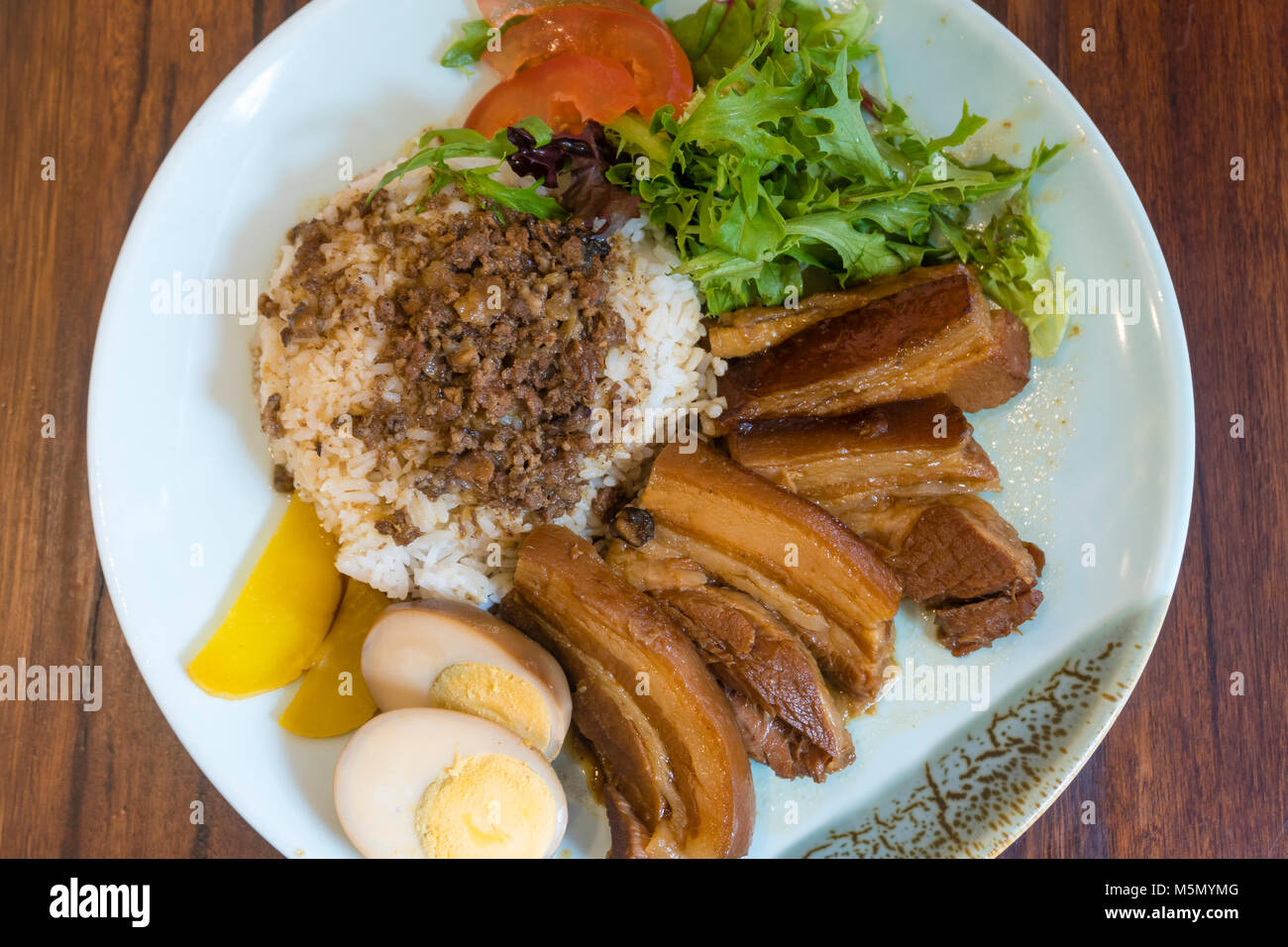 Stewed pork belly rice Stock Photo - Alamy