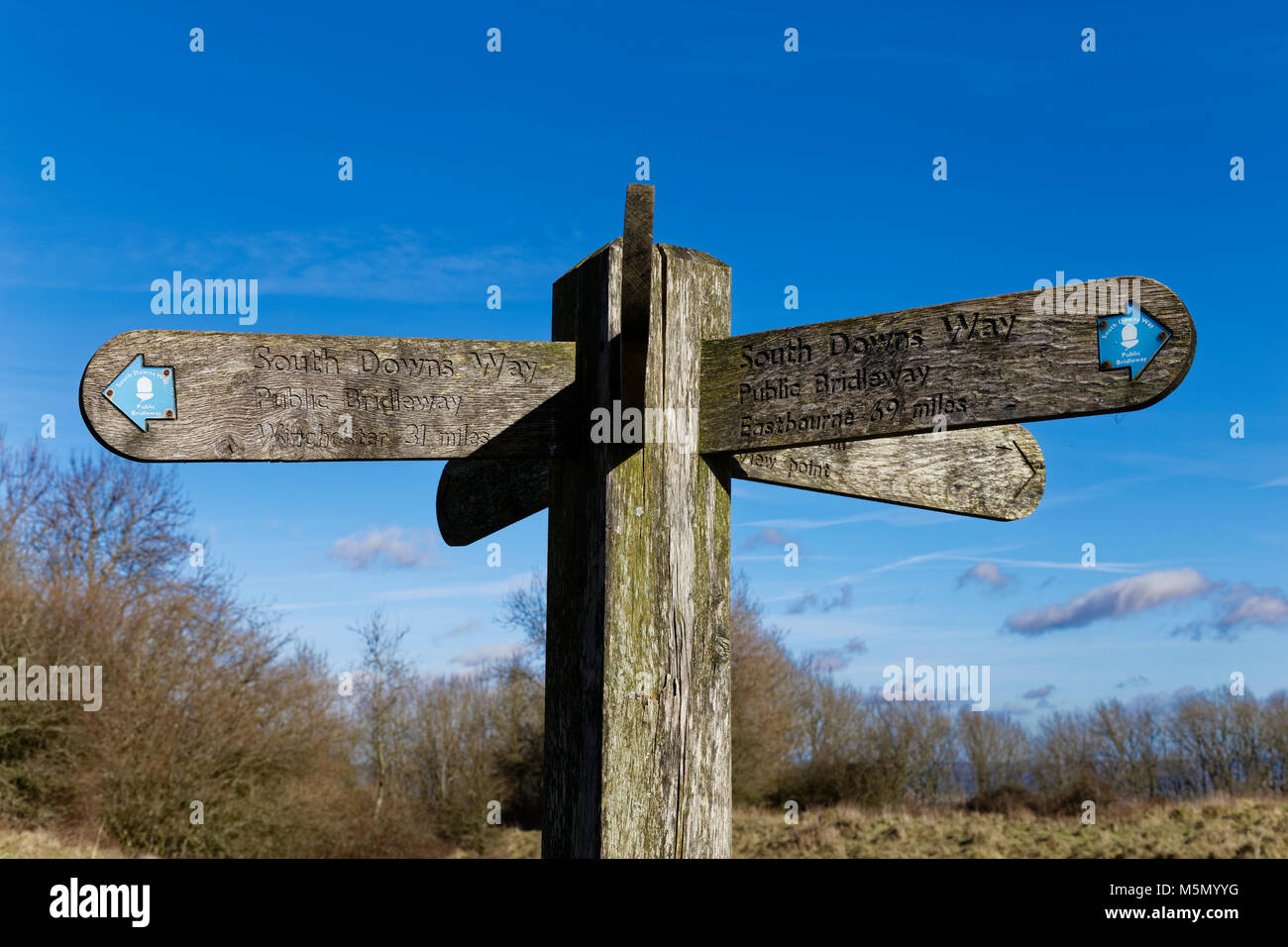 A four way signpost on the South Downs Way South Downs National Park ...