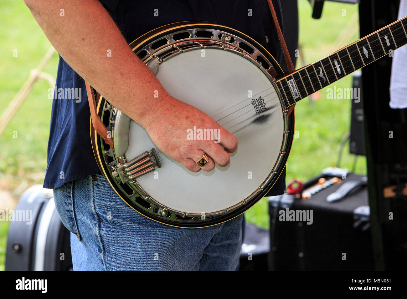Hand of a man playing a banjo Stock Photo - Alamy