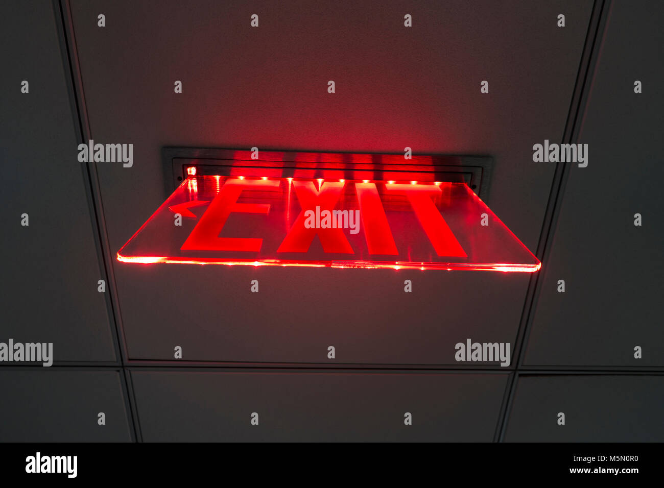 red and clear exit sign Stock Photo - Alamy
