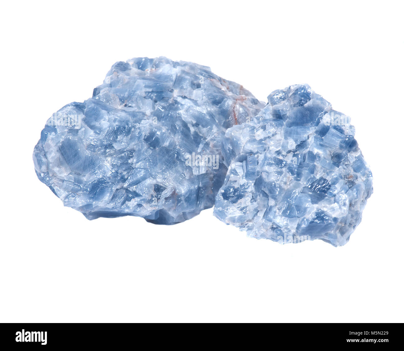 Raw blue calcite clusters isolated on white background Stock Photo - Alamy