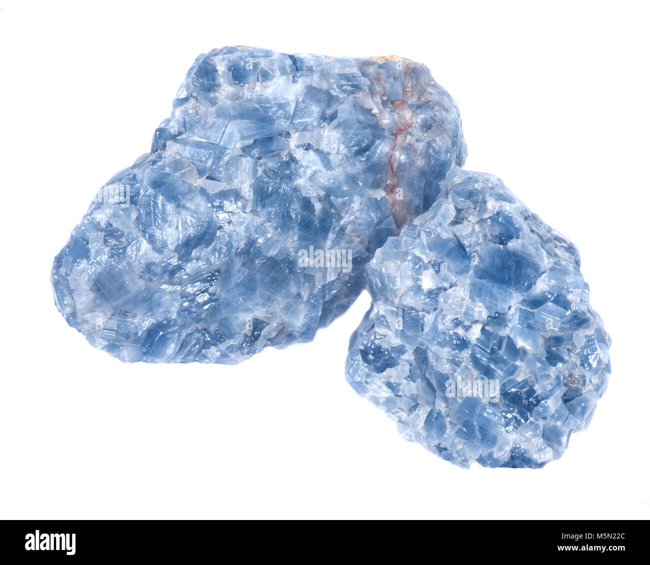 Raw blue calcite clusters isolated on white background Stock Photo - Alamy