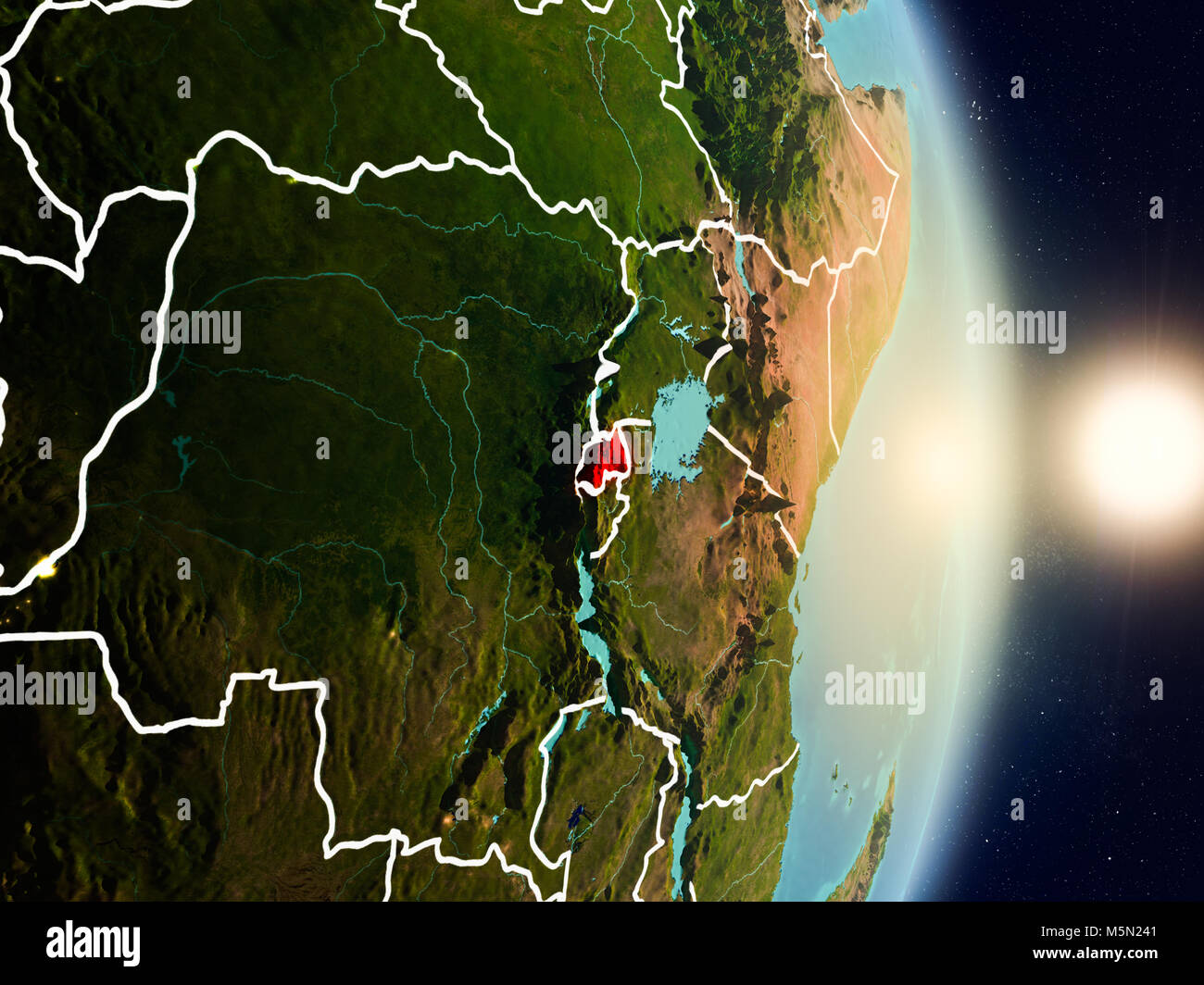 Rwanda during sunrise highlighted in red on planet Earth with visible country borders. 3D ...