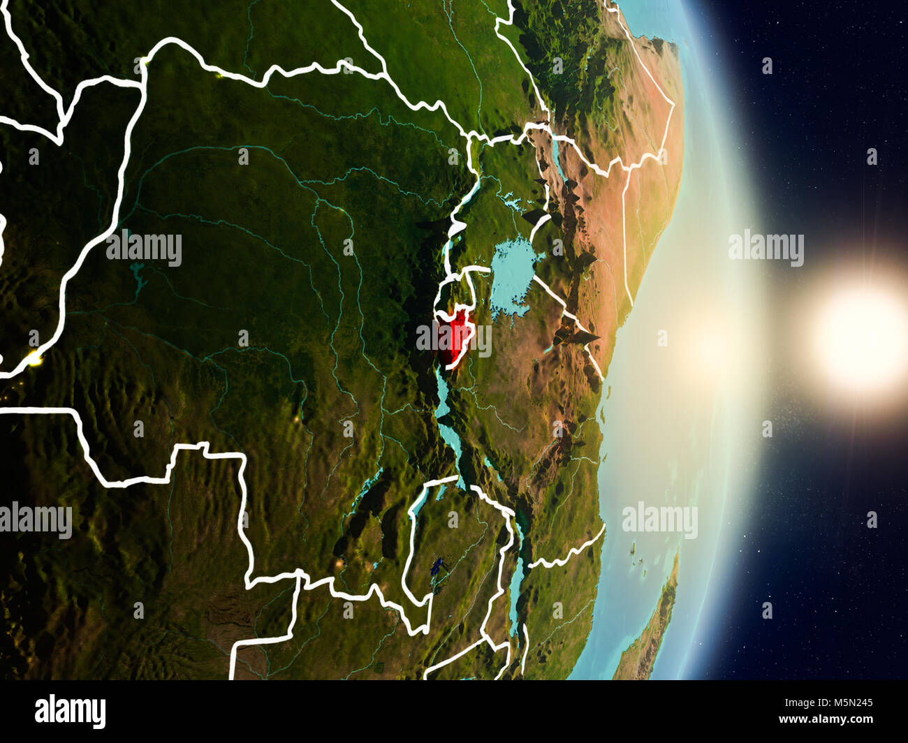 Burundi during sunrise highlighted in red on planet Earth with visible country borders. 3D ...