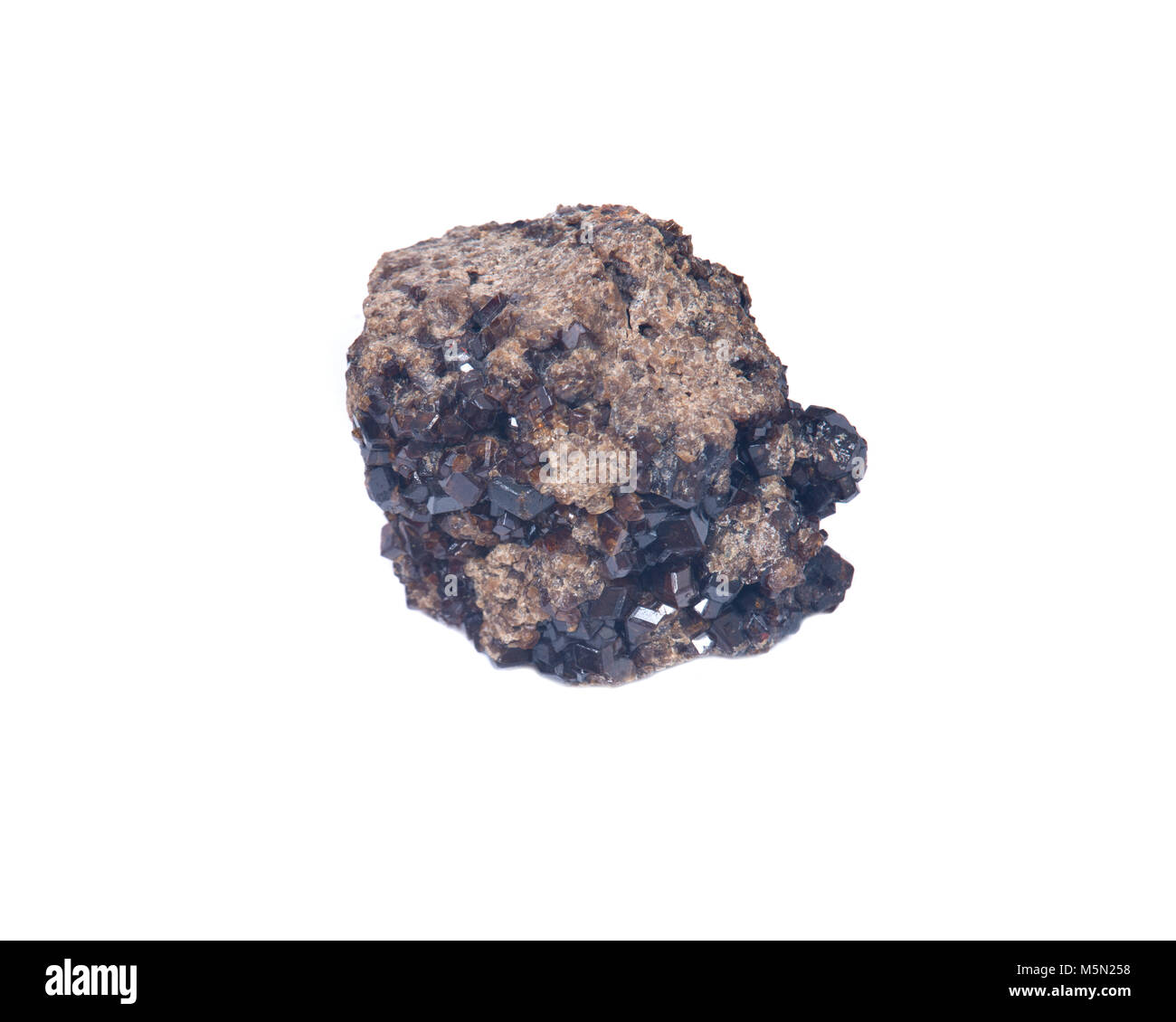 Chunky Grossular Garnet Specimen isolated on white background Stock ...