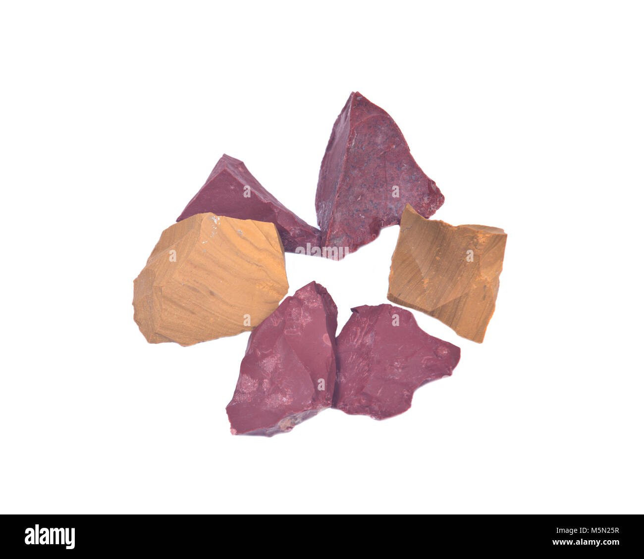 Yellow and red jasper natural chunks from Madagascar isolated on white ...