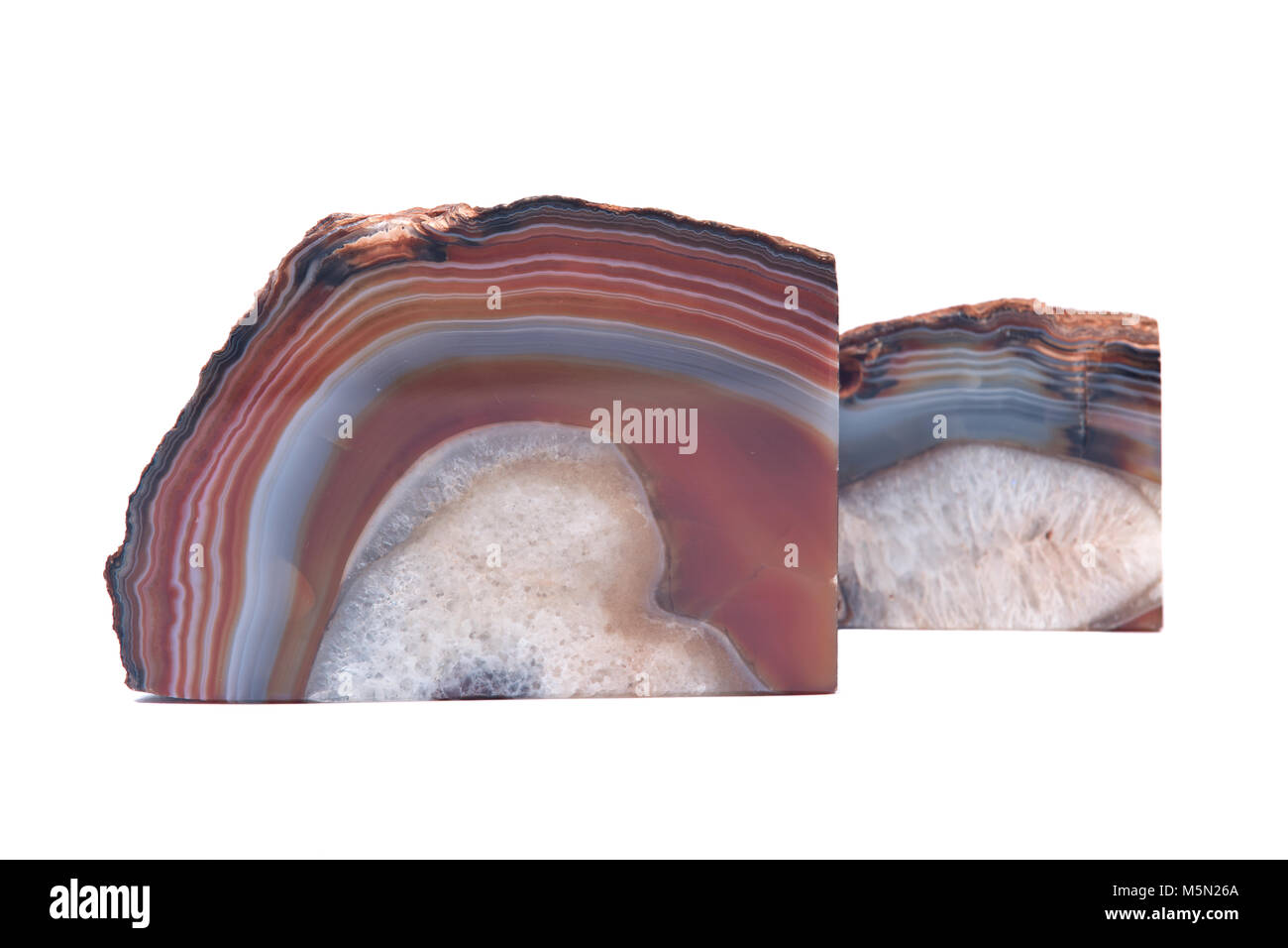 Pair of polished multicolor agate geode bookends isolated on white ...