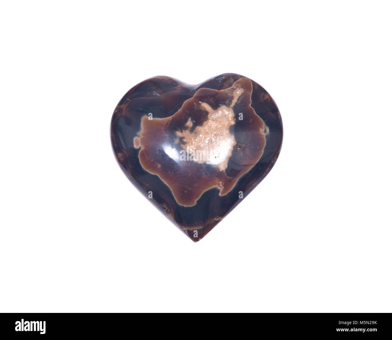 Polished aragonite heart from Peru isolated on white background Stock ...