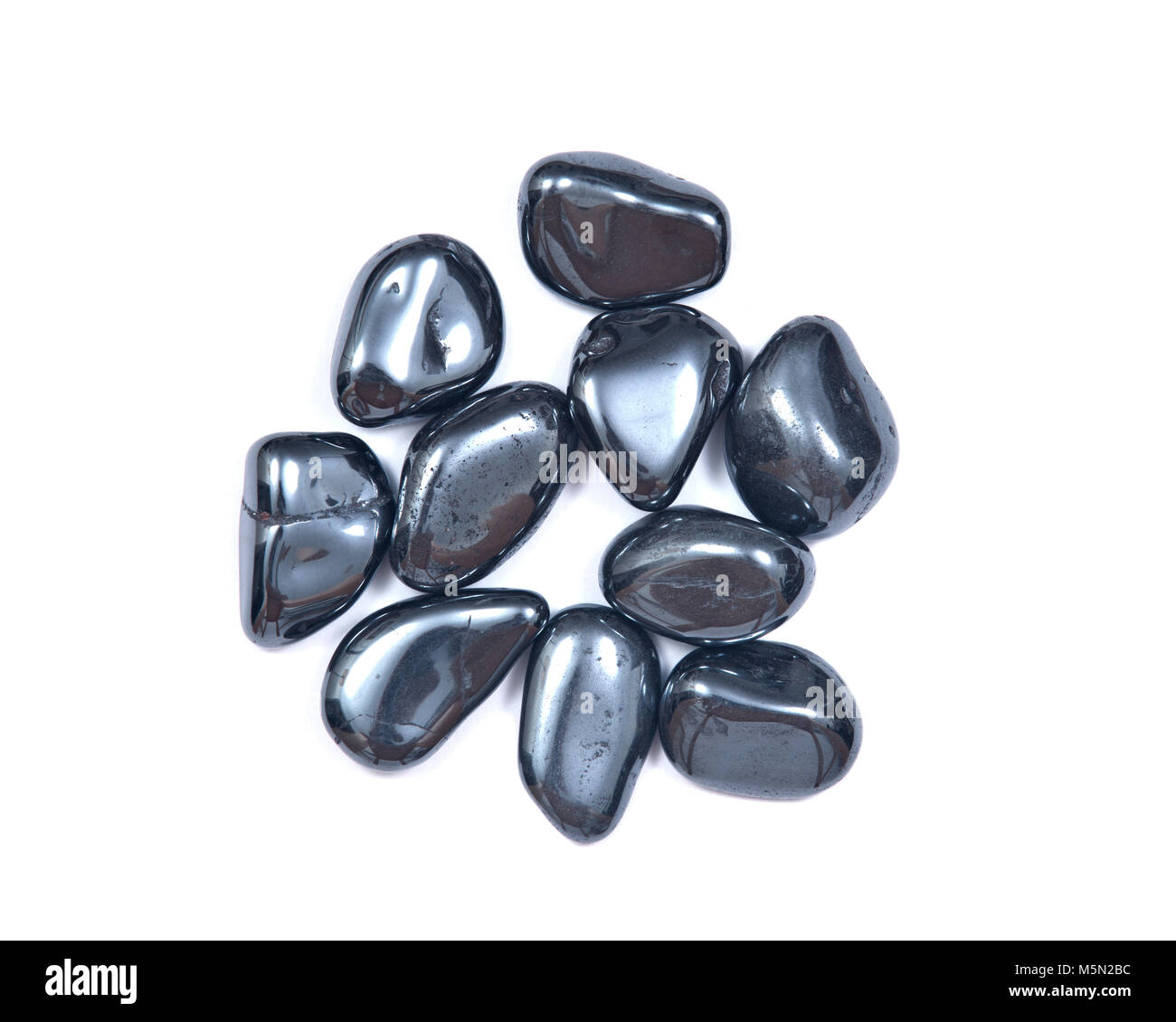 Bright and shiny metallic gray tumbled hematite isolated on white ...