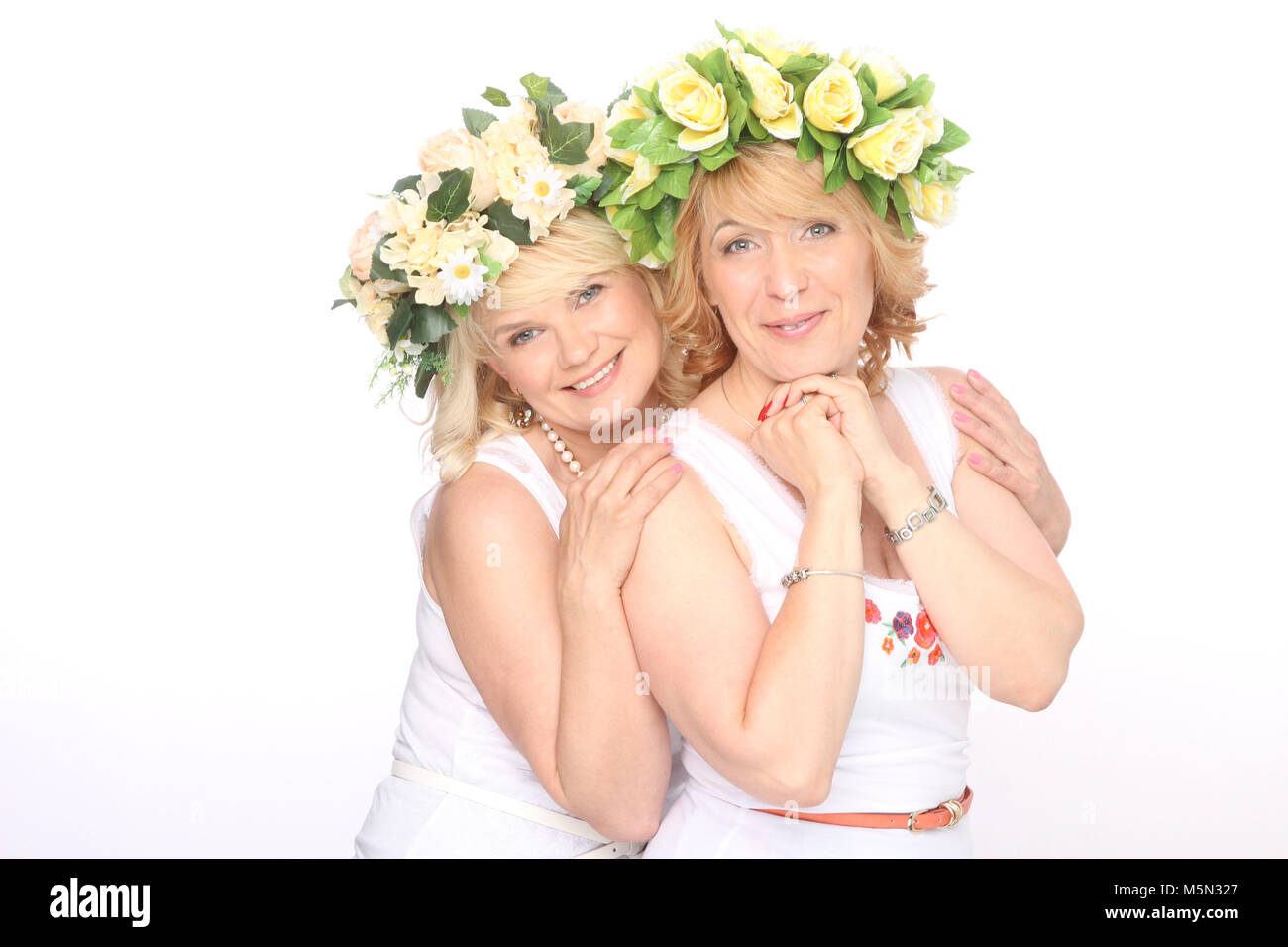 Two happy women friends laughing and hugging perfect white teeth Stock ...