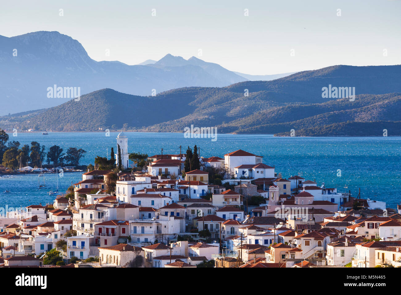 View of Poros island and mountains of Peloponnese peninsula in Greece ...