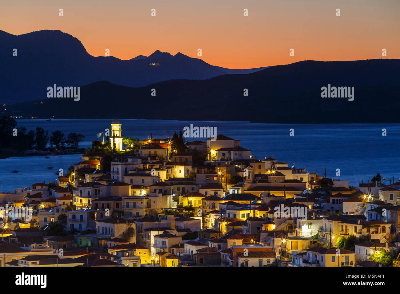 View of Poros island and mountains of Peloponnese peninsula in Greece ...