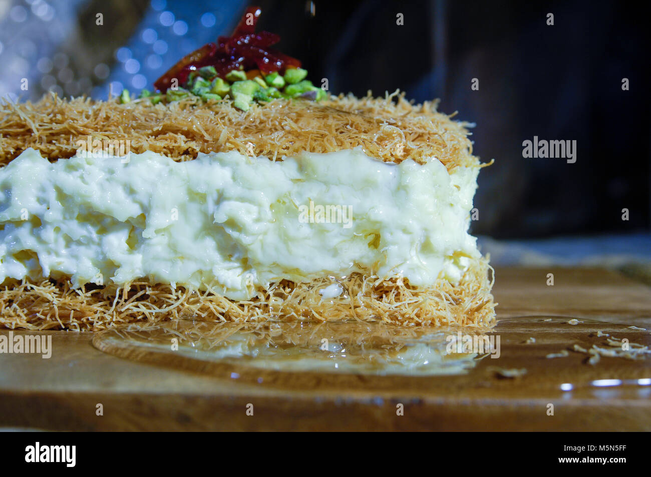 Pouring Syrup on Osmaliya, Arabic Sweets with Cream for Ramadan and Eid ...